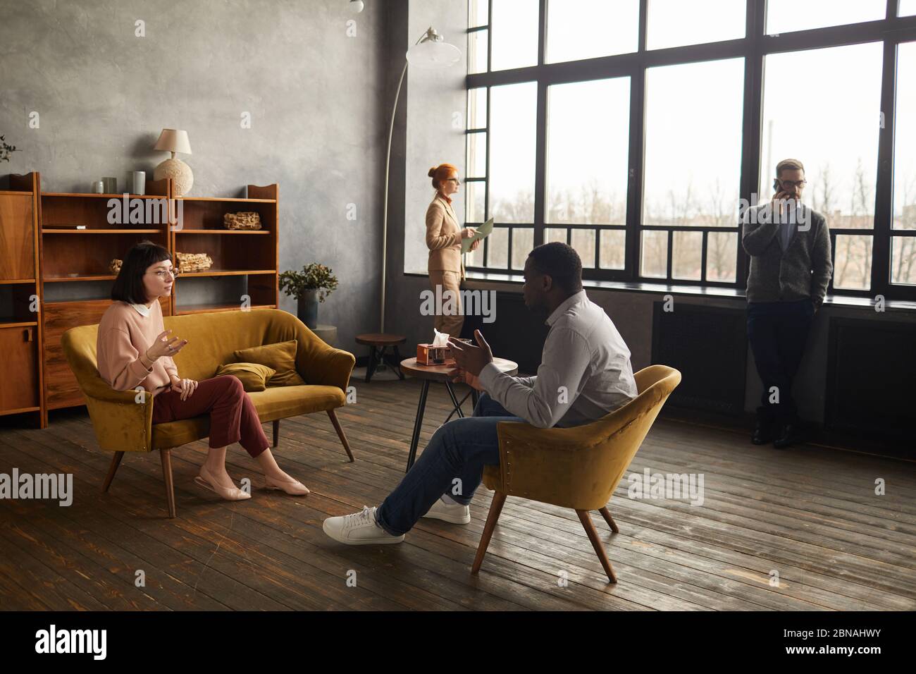 Business people doing their work during work day at office Stock Photo ...