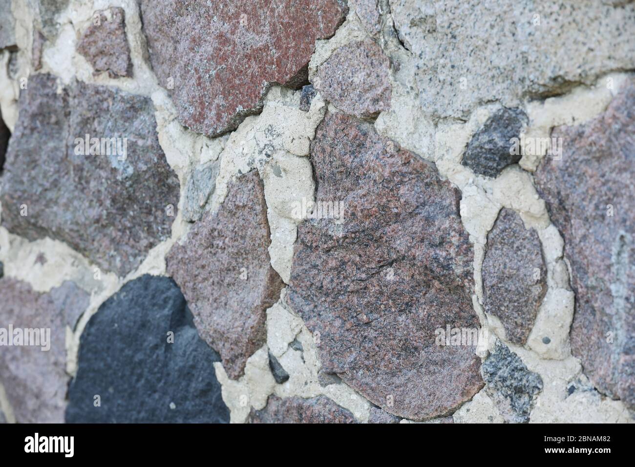 Old stone wall texture. Construction material Stock Photo - Alamy