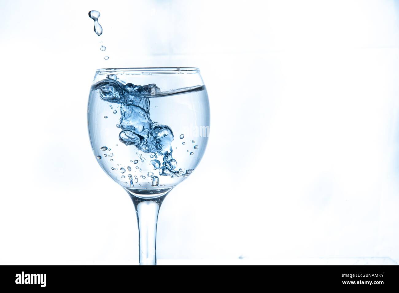 water splashing from glass isolated on white background isolated Stock ...