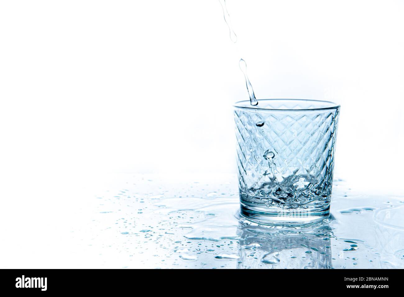 water splashing from glass isolated on white background isolated Stock ...