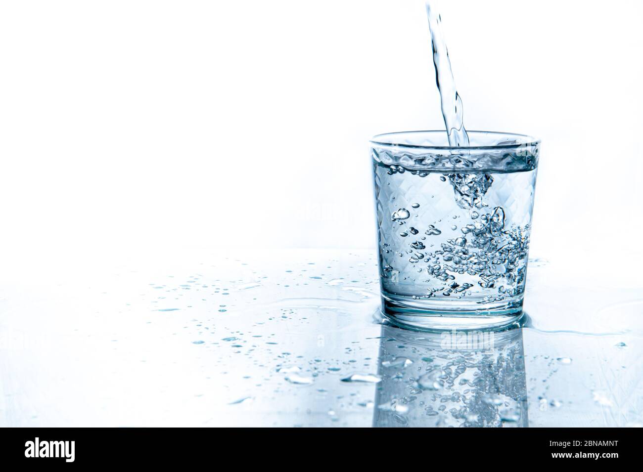 water splashing from glass isolated on white background isolated Stock ...
