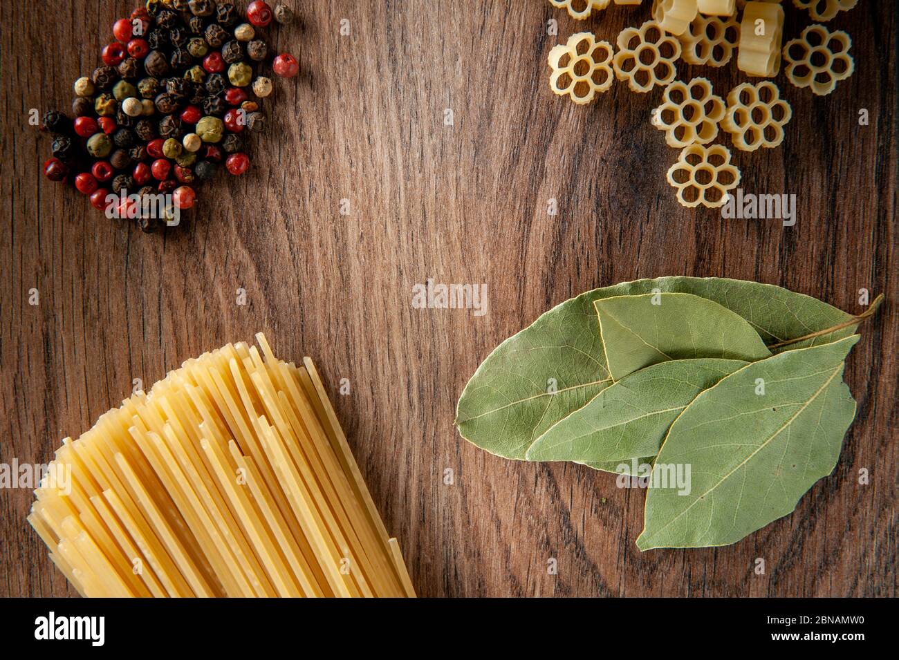 Long raw pasta on red hi-res stock photography and images - Alamy