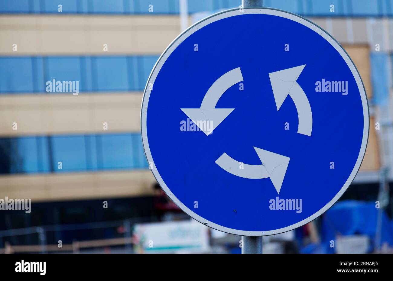 traffic sign circulation site, white arrows on blue background Stock ...