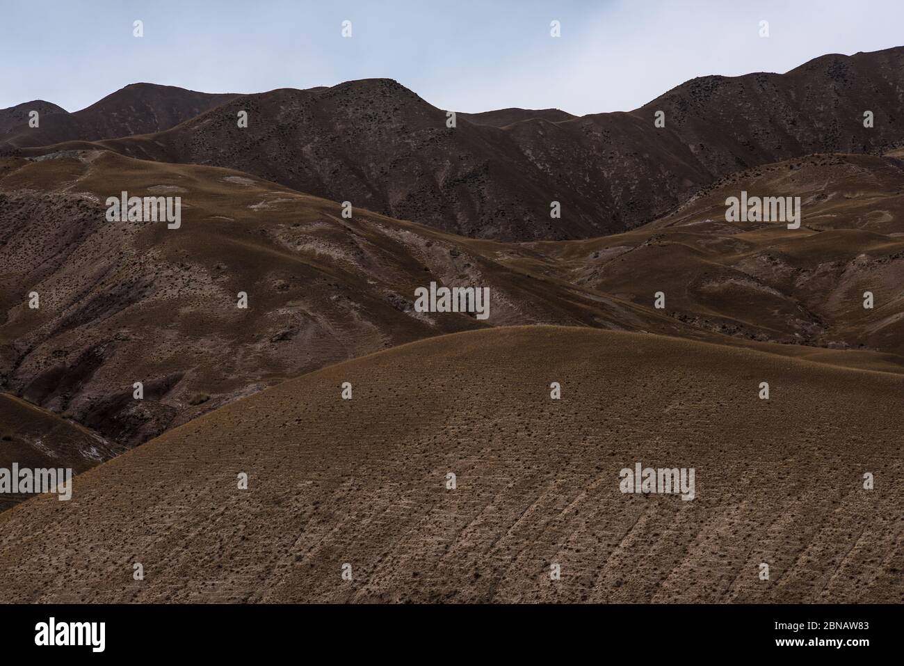 Barren mountains on rocky desert landscape Stock Photo - Alamy