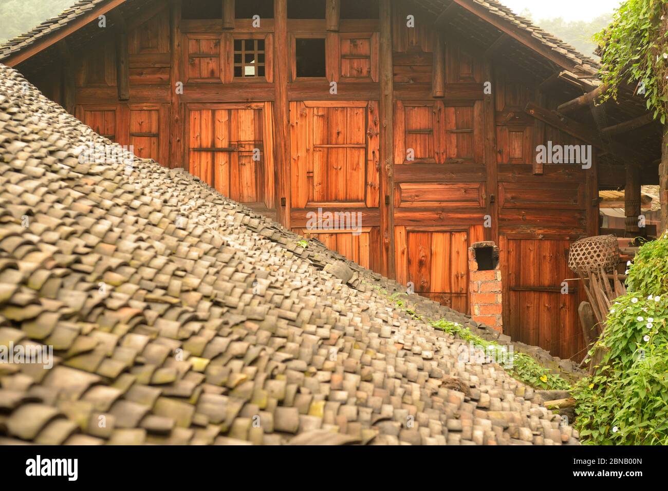 Old wooden chalet in Chinese village Stock Photo - Alamy