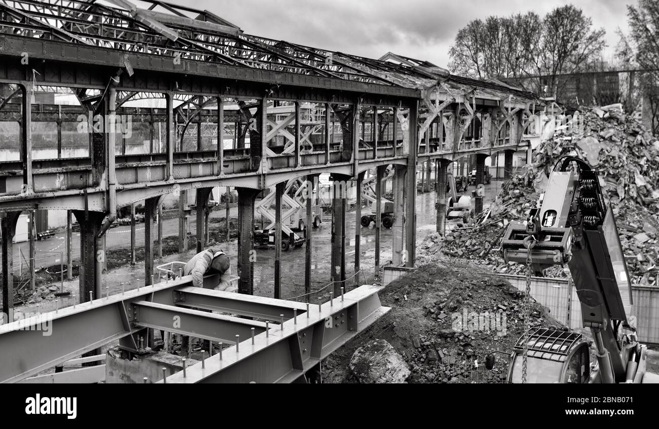 Metal structure of ancient factory partially demolished Stock Photo - Alamy