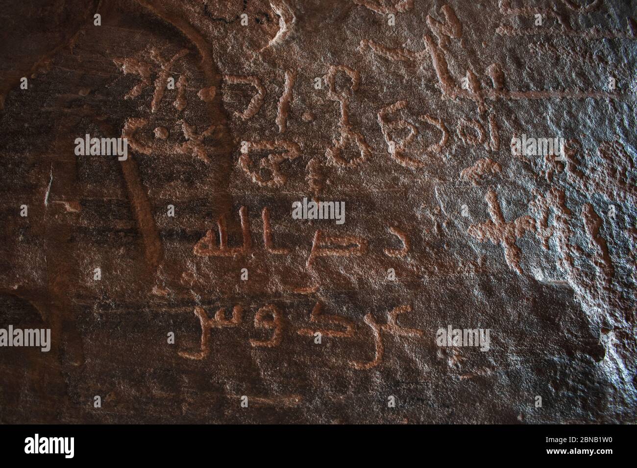 Arabic inscriptions in Wadi Rum desert, Jordan Stock Photo - Alamy