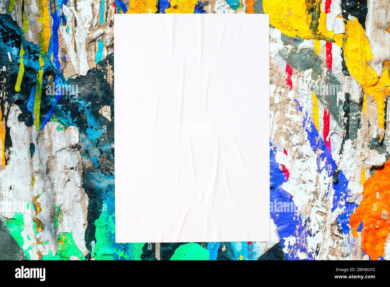 Closeup of colorful messy painted urban wall texture with wrinkled ...