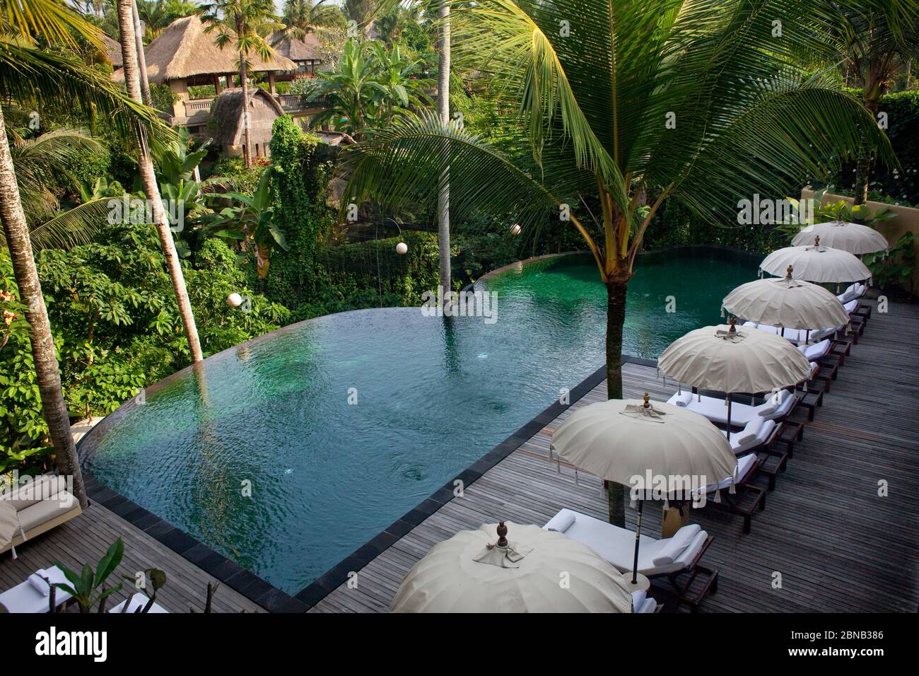 Horizontal view of the beautiful Komaneka at Rasa Sayang Hotel swimming ...