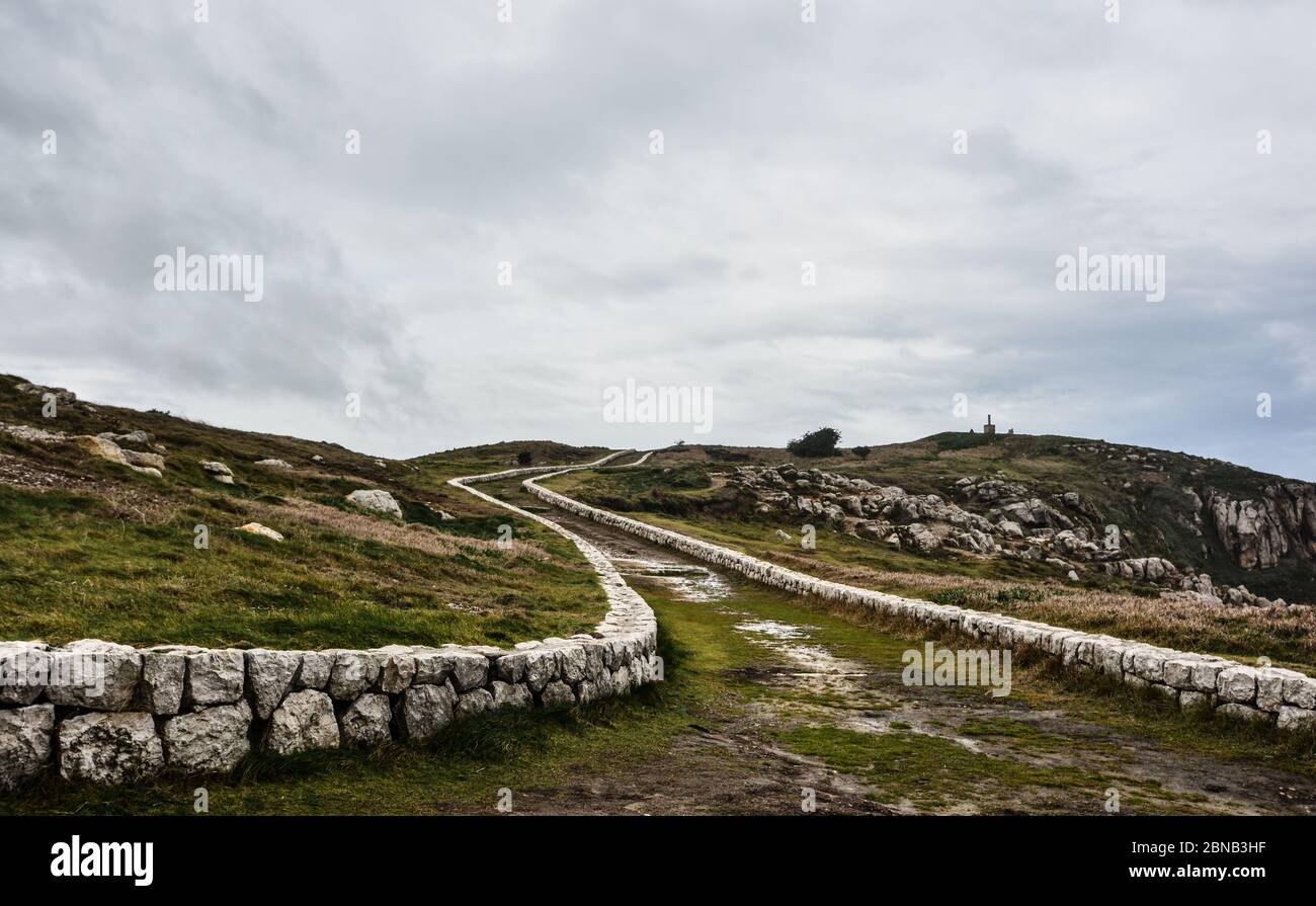 Beautiful landscape with a rocky pathway and rock formations under a ...