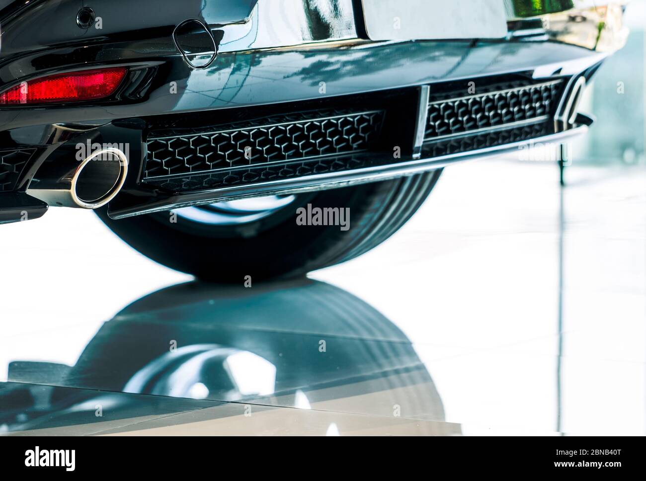 Closeup detail exhaust pipe of car that parked in showroom with ...