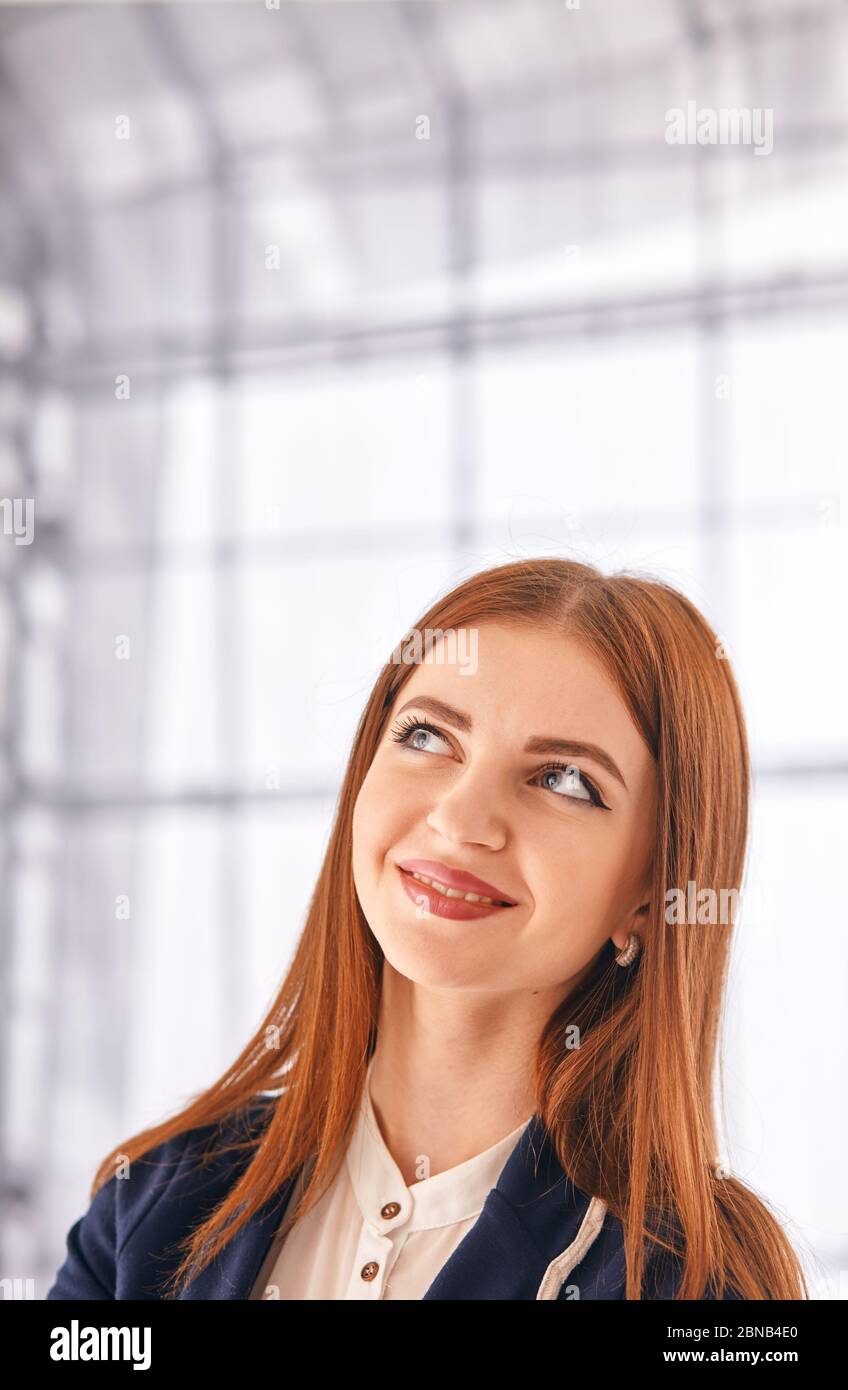 Beautiful business woman having some great idea Stock Photo - Alamy
