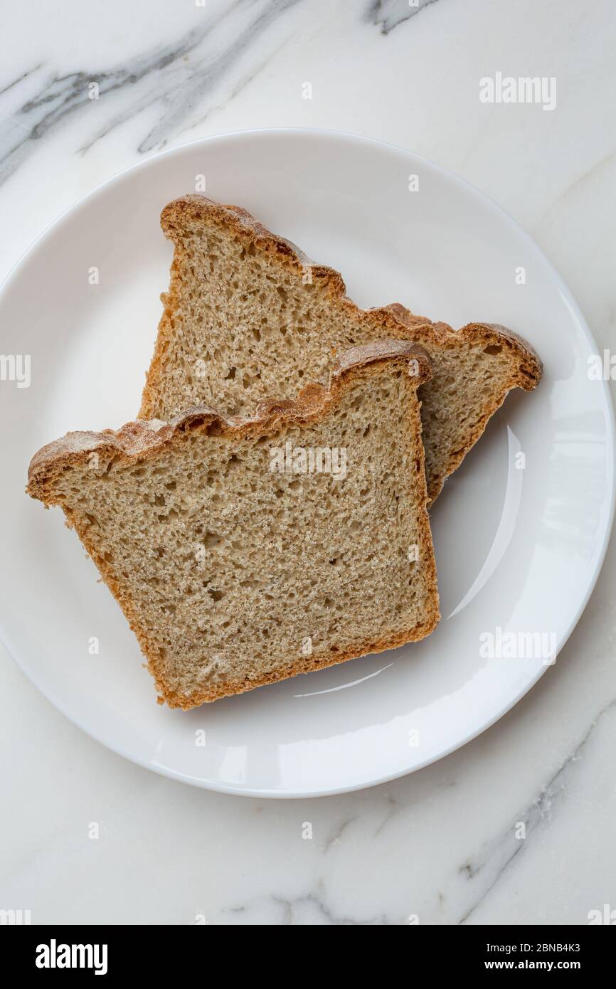 Directly above shot of two slices of bread on plate Stock Photo - Alamy