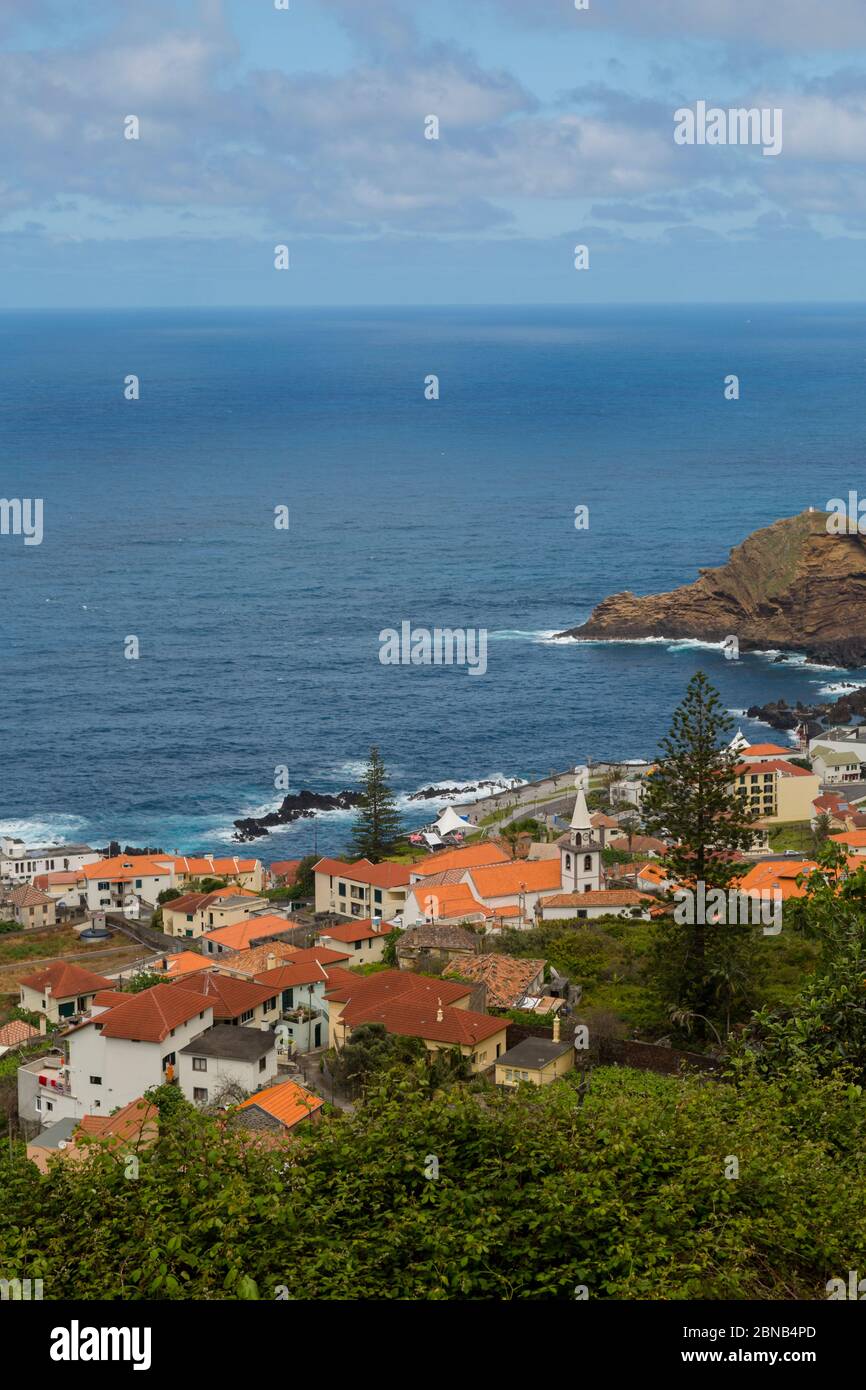 View of seaside town from elevated position, Porto Moniz, Madeira ...