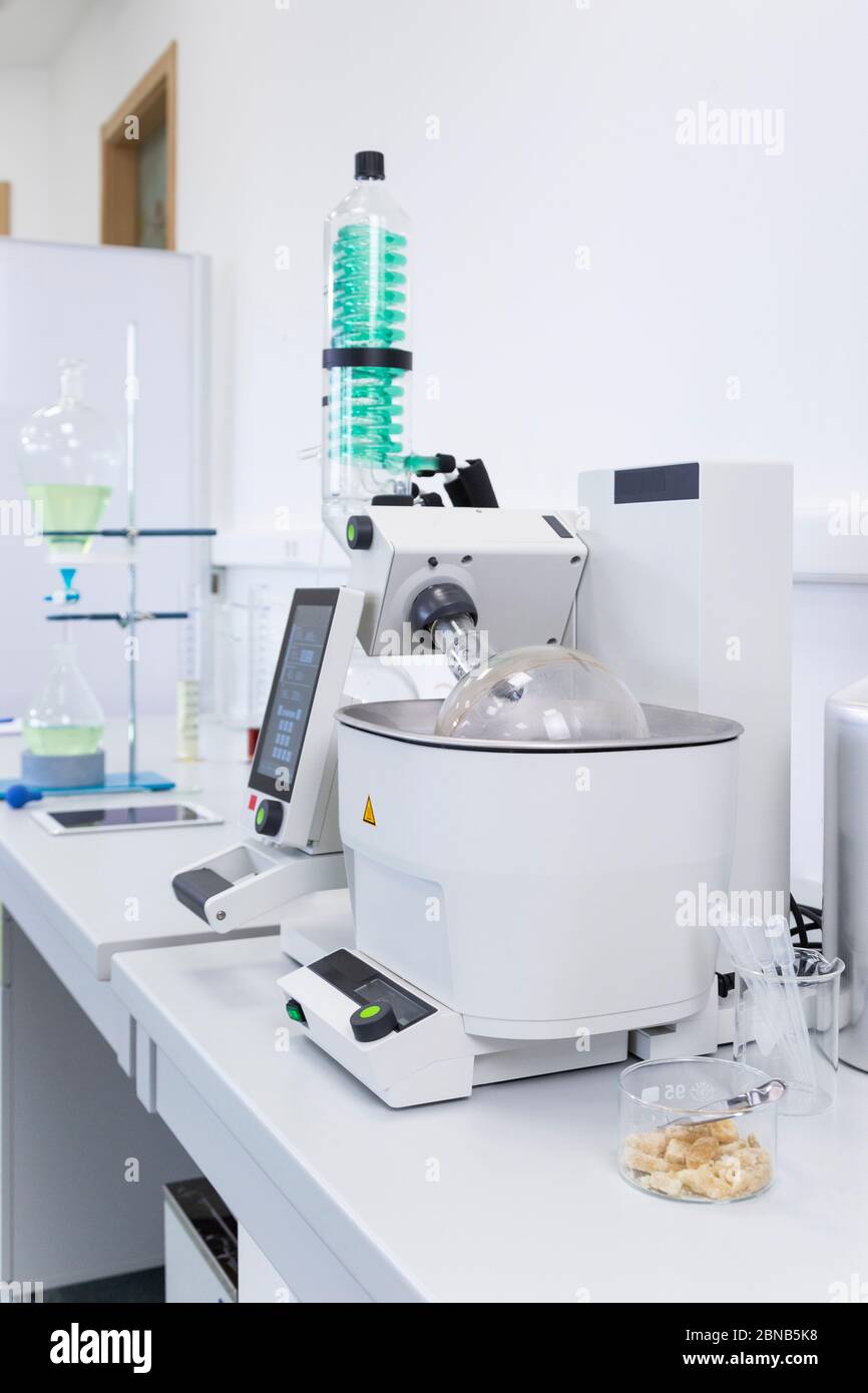 Rotational vaporizer called rotavapor with green condenser placed on ...