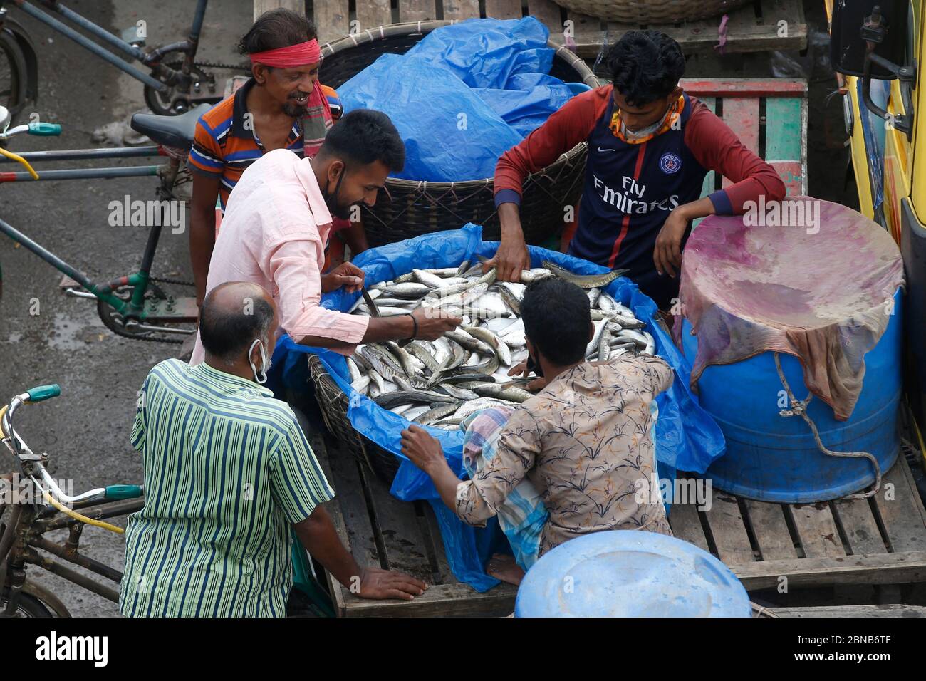 The swarming crowd of people at the kitchen market in the capital’s ...
