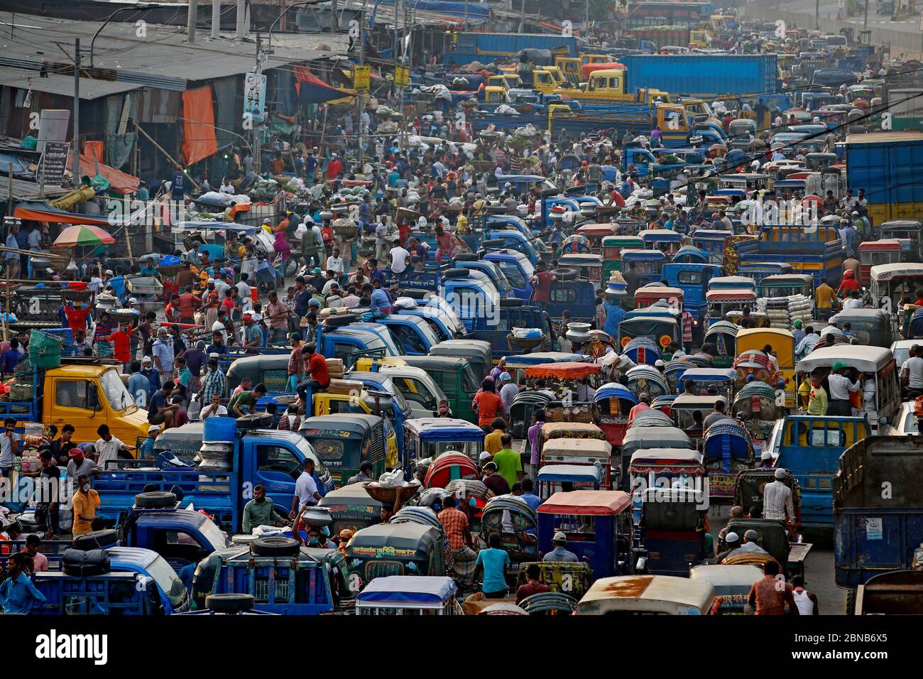 The swarming crowd of people at the kitchen market in the capital’s ...