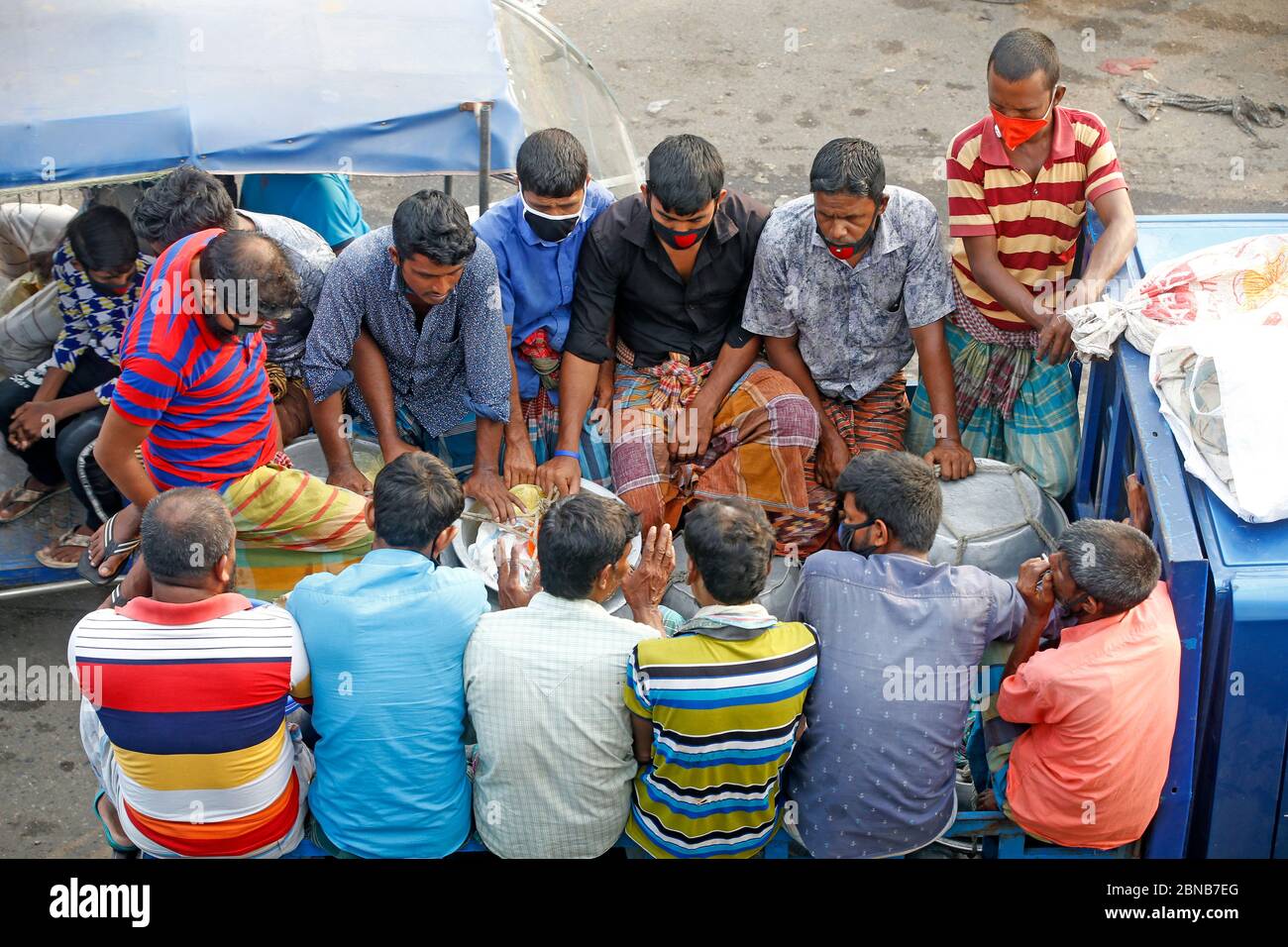 The swarming crowd of people at the kitchen market in the capital’s ...
