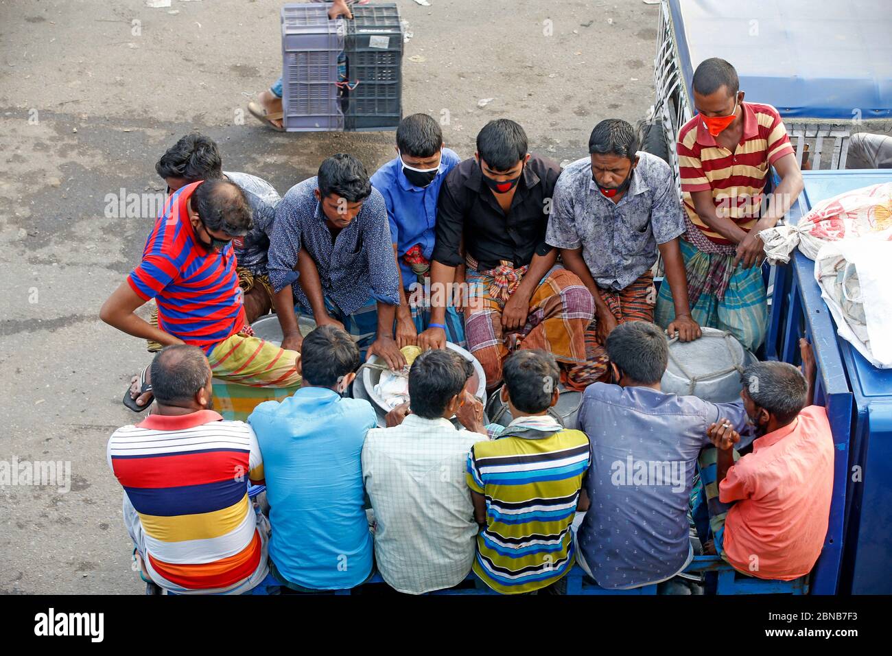 The swarming crowd of people at the kitchen market in the capital’s ...