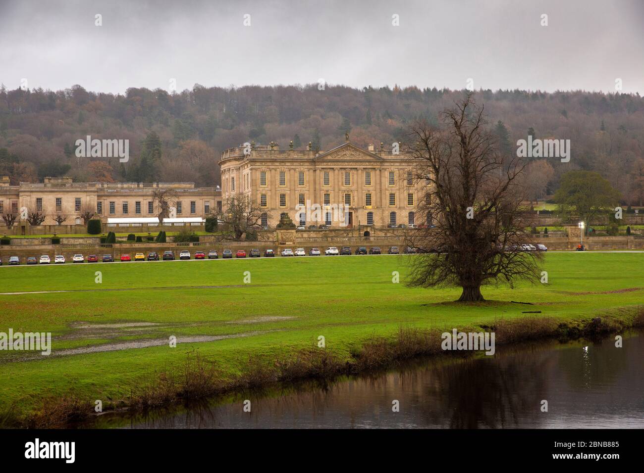 UK, England, Derbyshire, Edensor, Chatsworth House across River Derwent ...