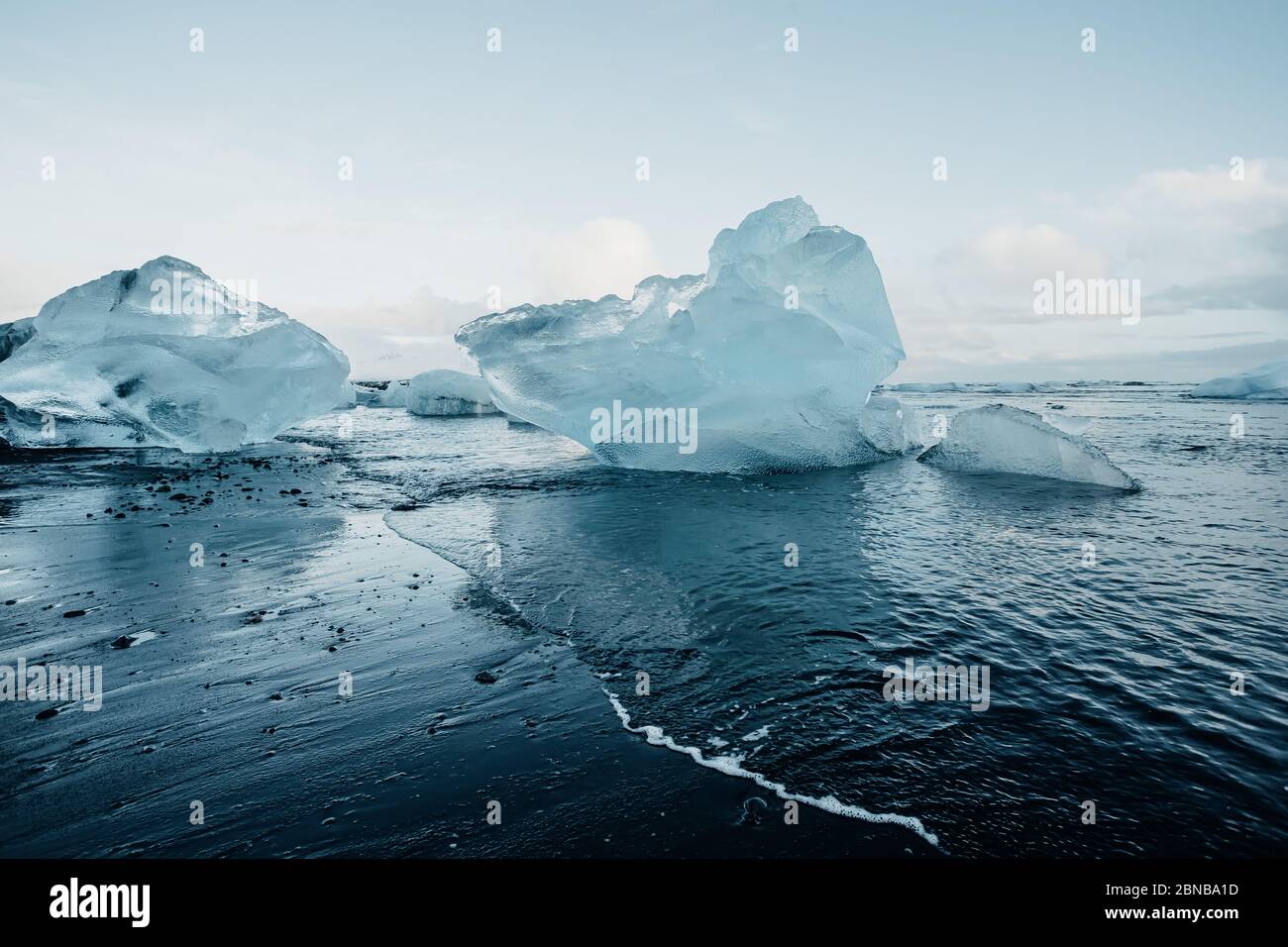 Breathtaking diamond beach on Iceland in winter with large ice blocks ...