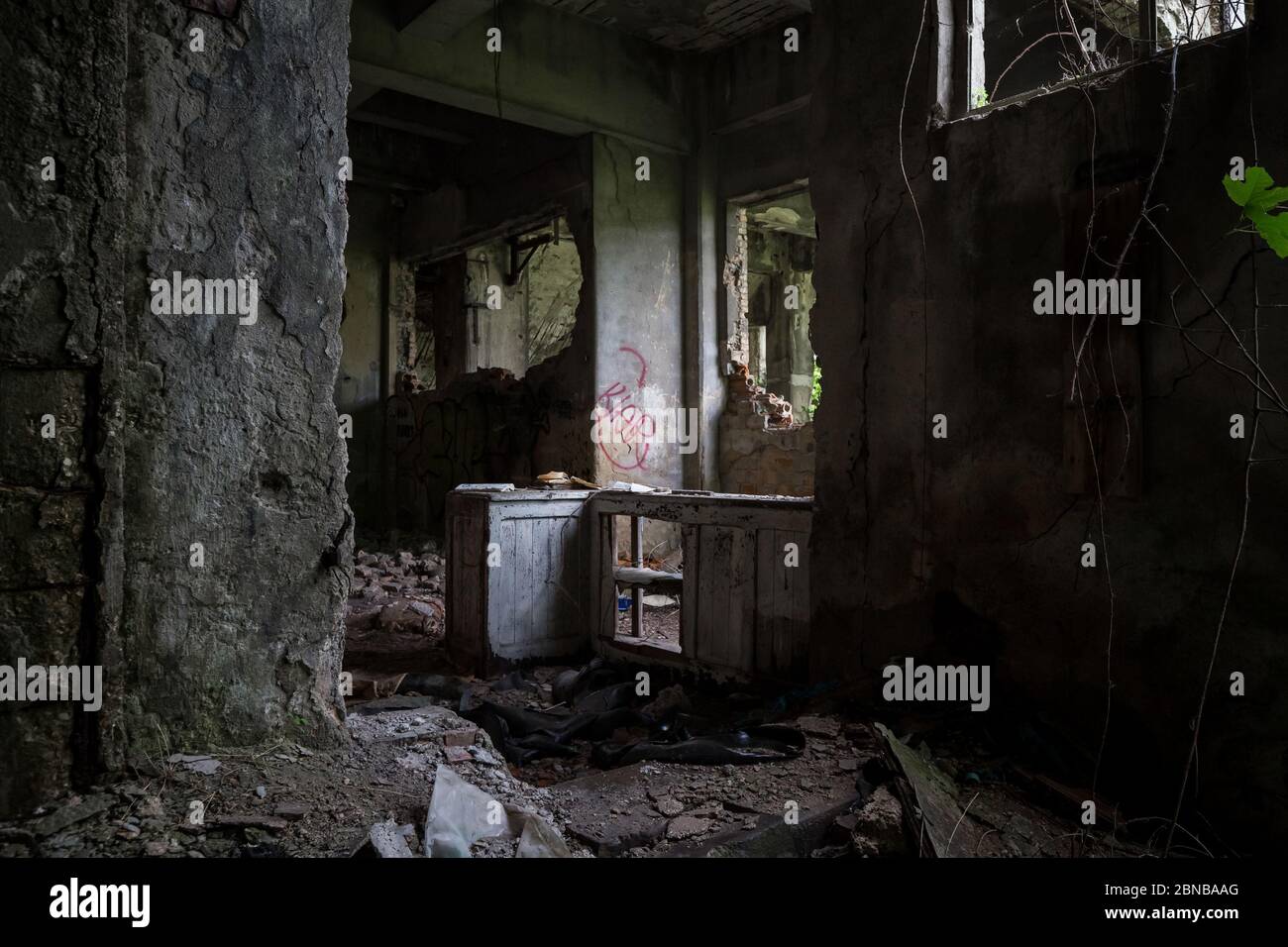 Inside damaged structure of an abandoned building Stock Photo - Alamy