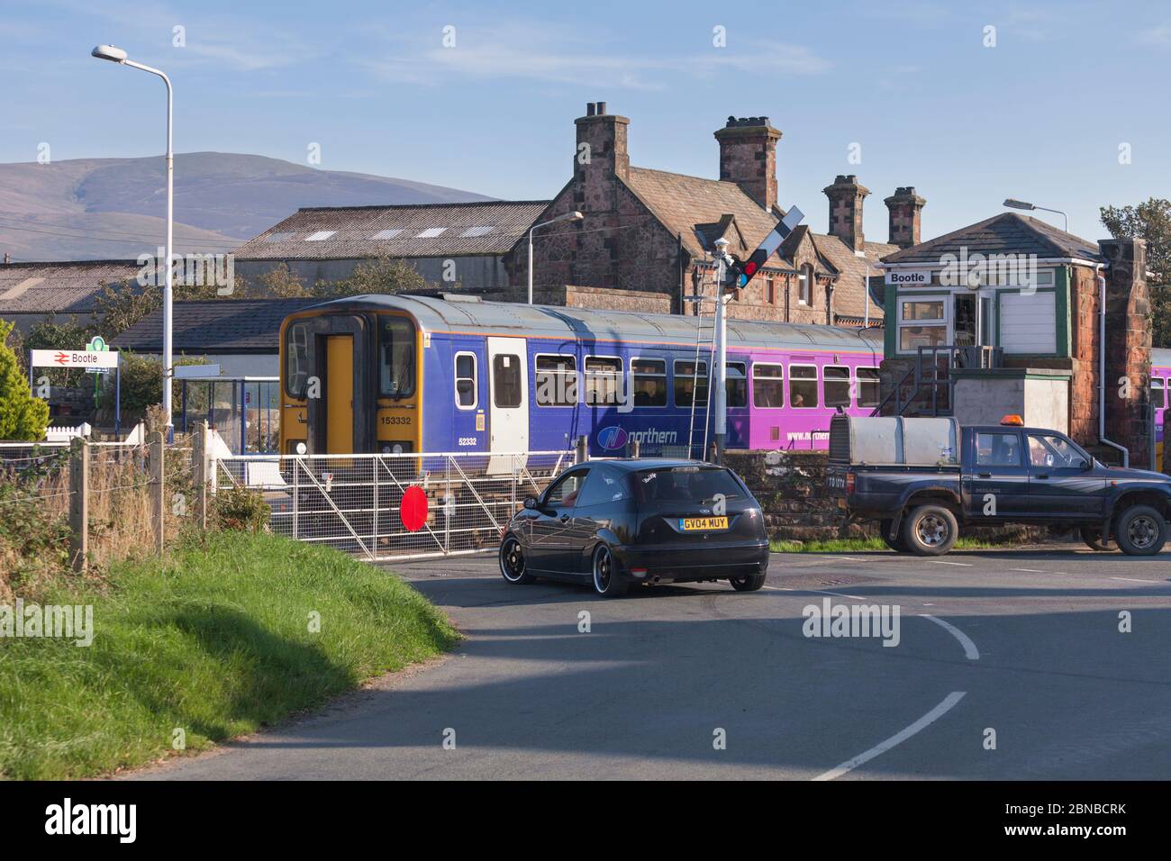 Northern Rail class 153 sprinter train on the manual gated level ...