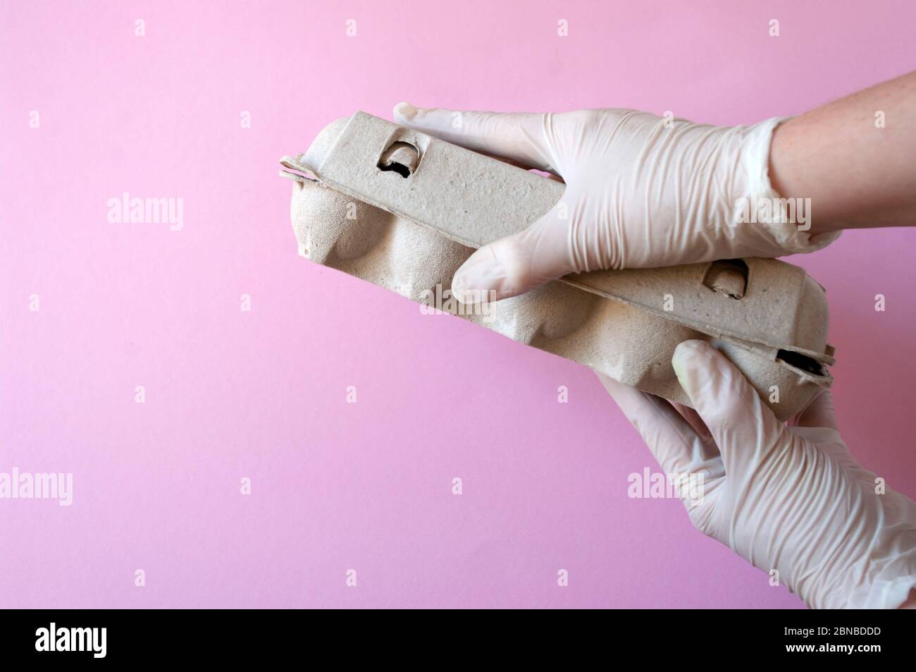 Female hand holds container hi-res stock photography and images - Alamy