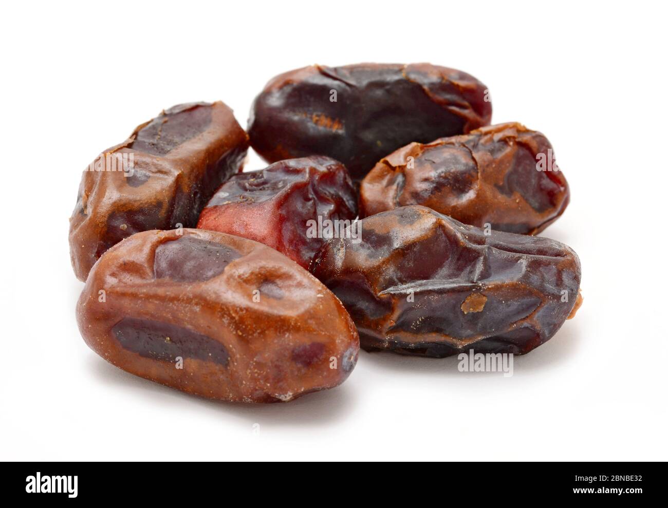 Group of natural Arabian dried dates on white background Stock Photo ...