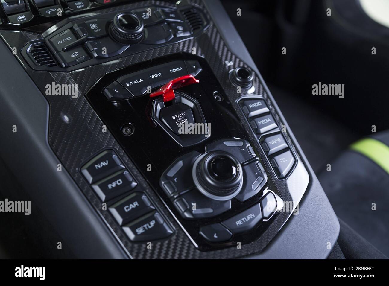 Beautiful shot of a black start engine dashboard on a sports car Stock ...