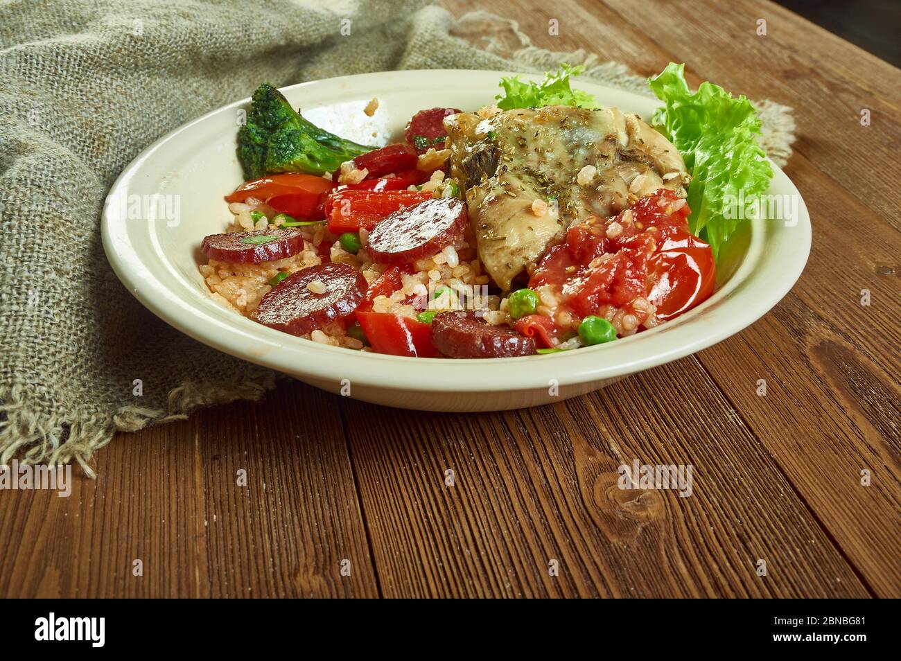 Baked rabbit chorizo rice, spiced with chorizo, paprika and saffron ...