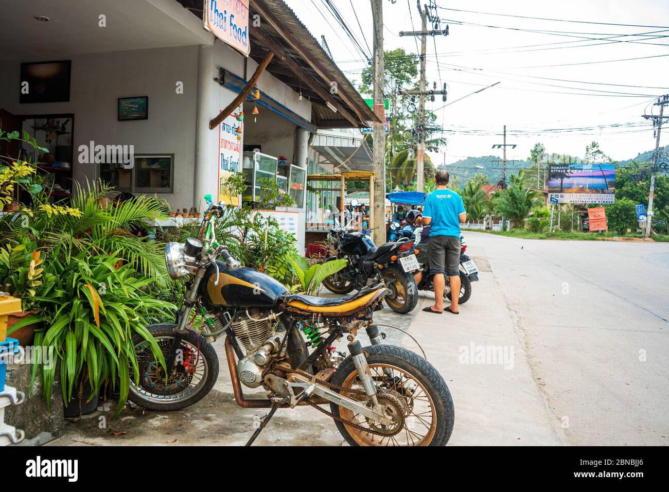 Old rusty motorcycle. typical vehicle in Asia. A crumbling motorcycle ...