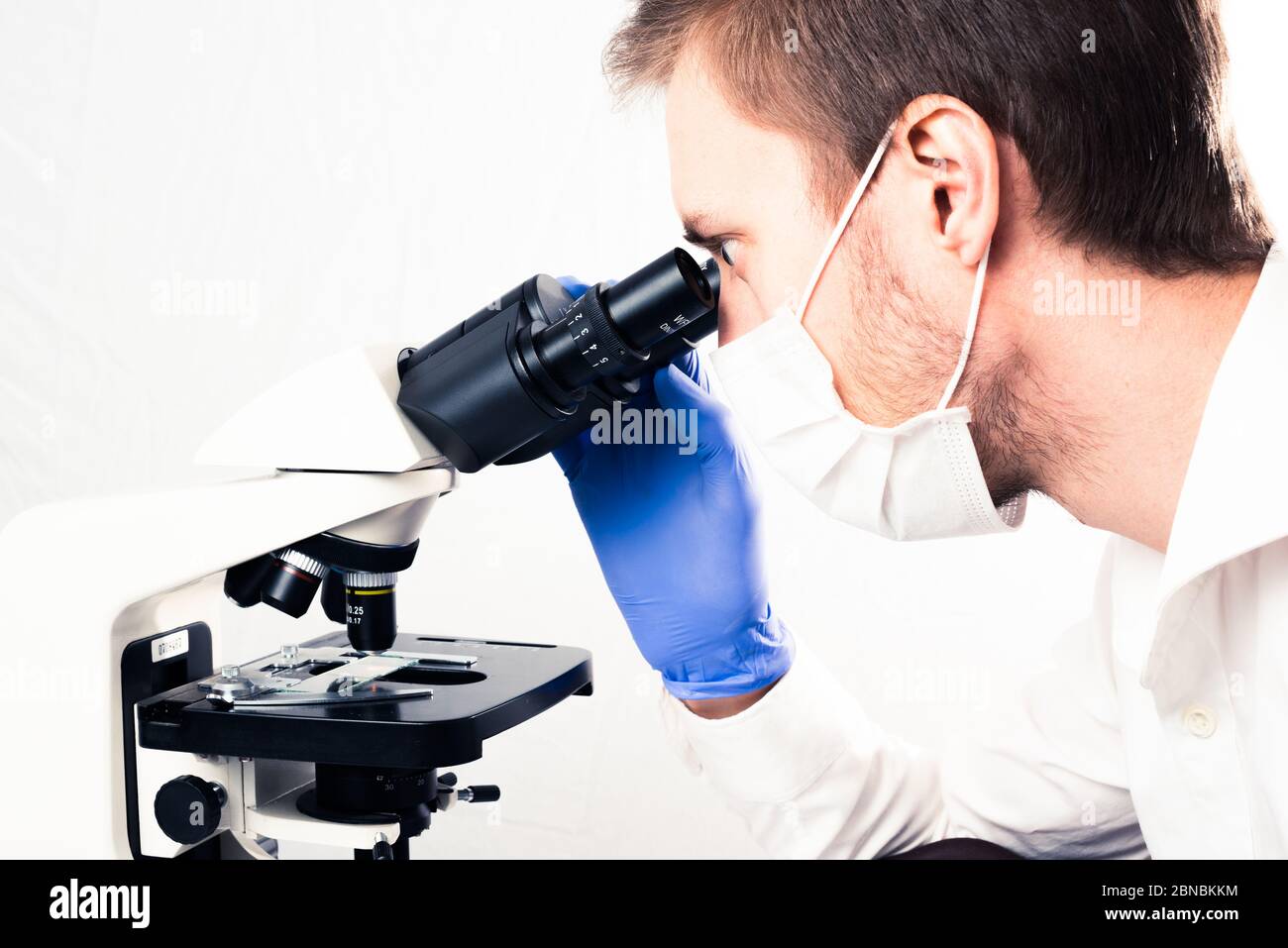 Young male scientist doctor analyzing hi-res stock photography and ...