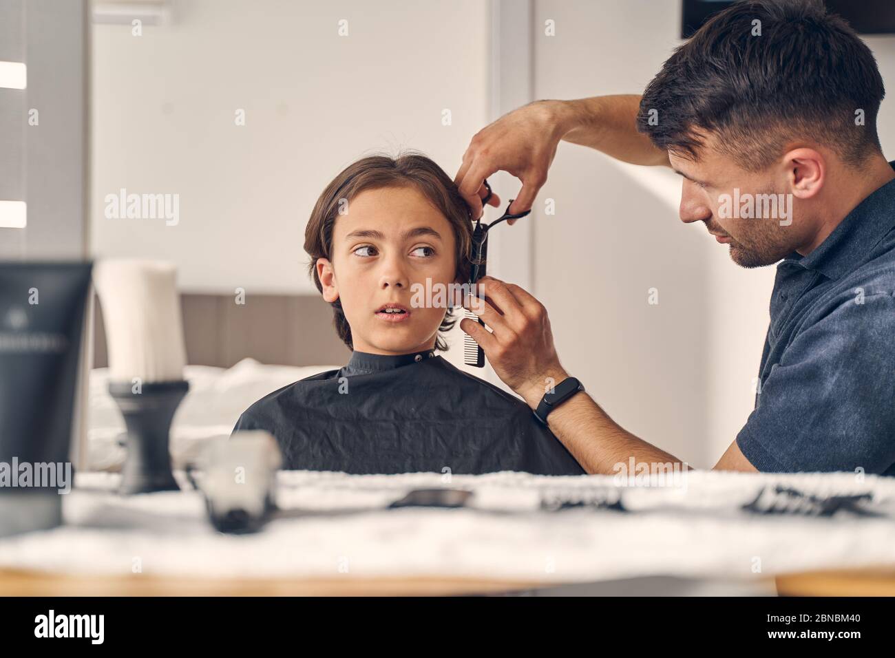 Small boy getting new haircut at home Stock Photo - Alamy
