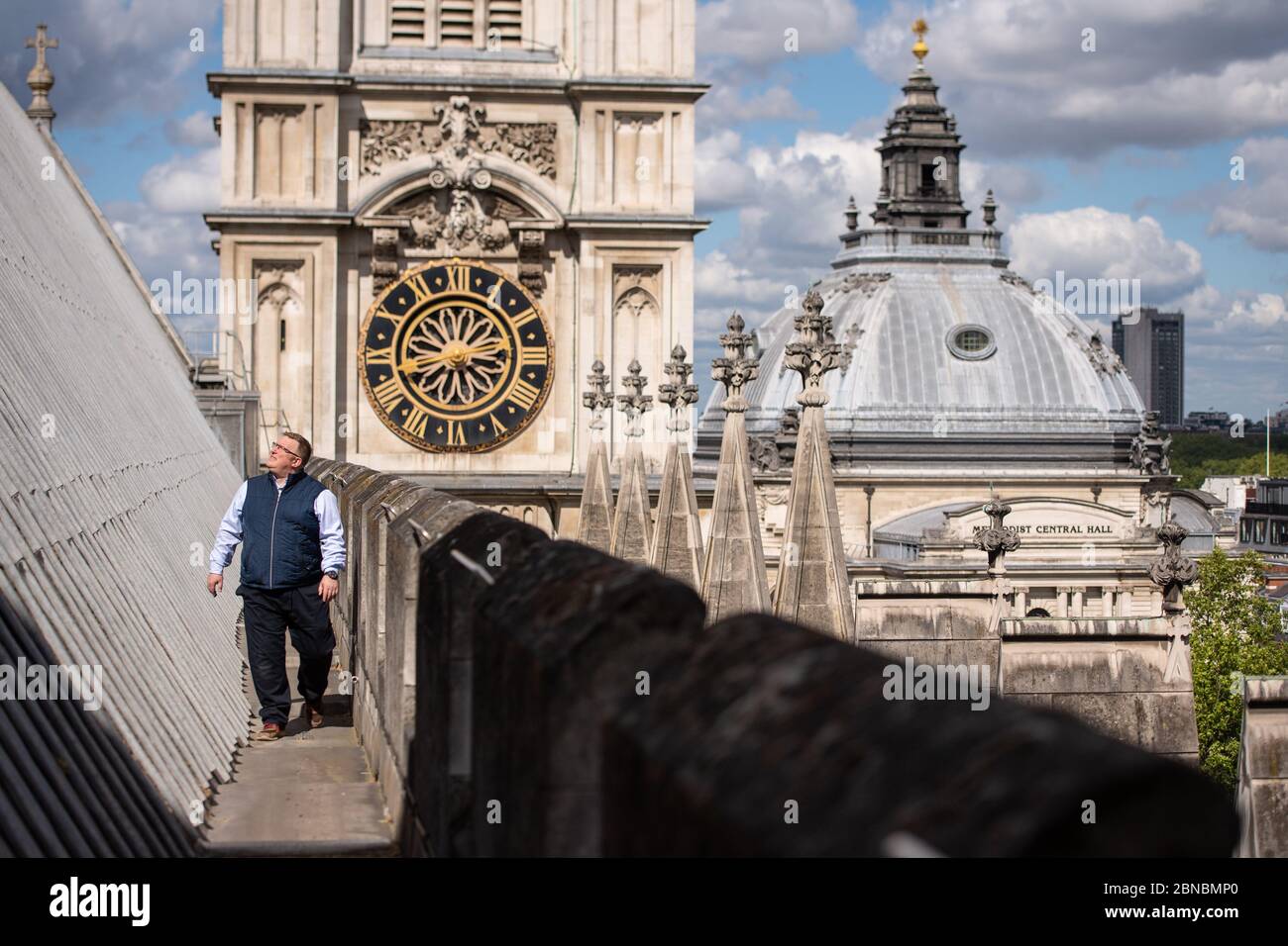 Clerk of the Works Ian Bartlett inspects the main nave roof near the ...