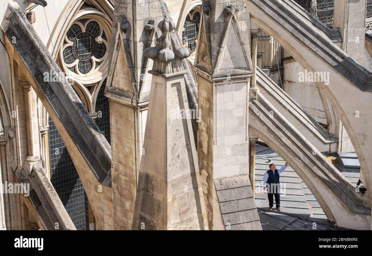 Clerk of the Works Ian Bartlett checks the Triforium roof at ...