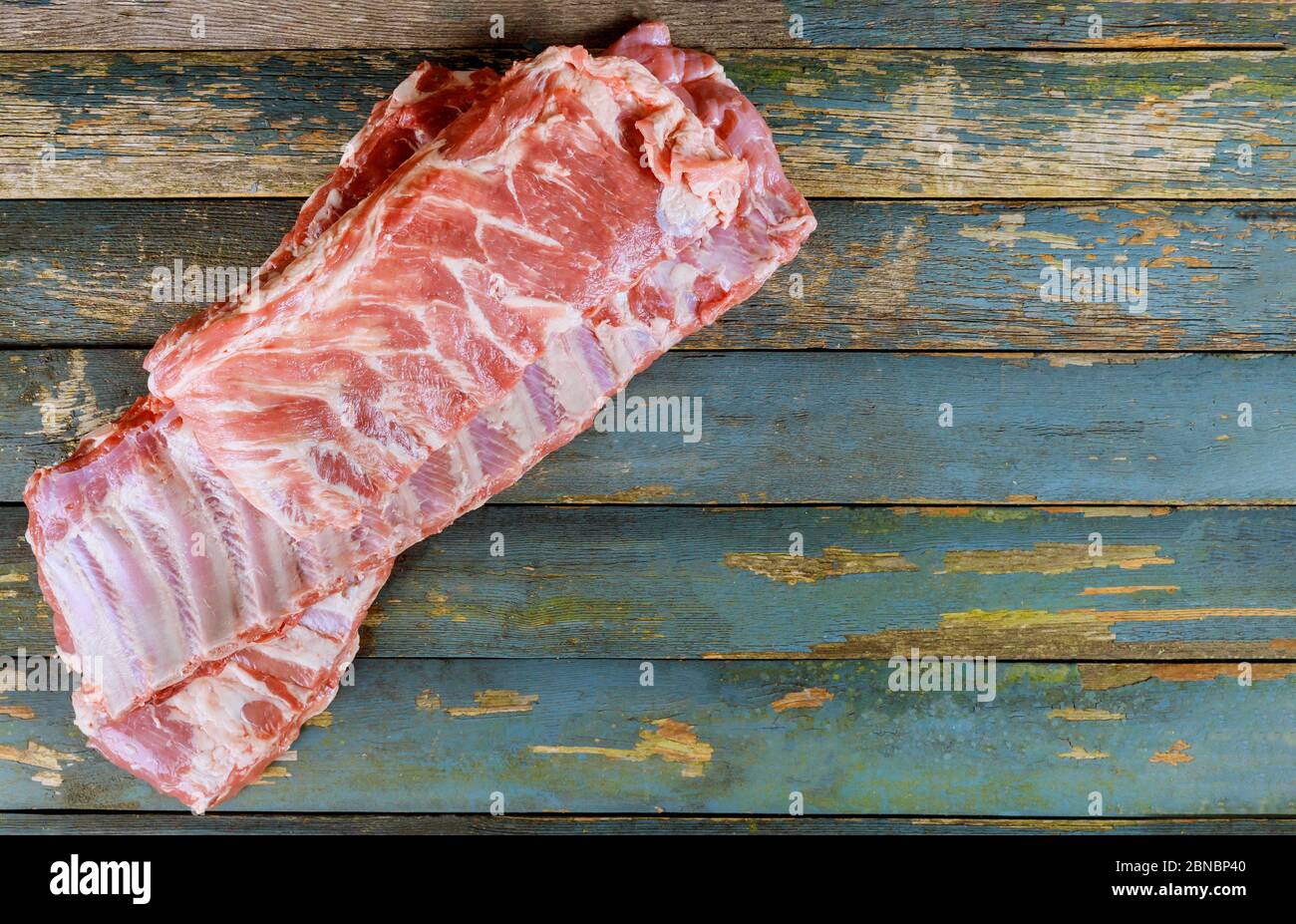 Fresh of raw pork ribs with rustic wooden board Stock Photo - Alamy