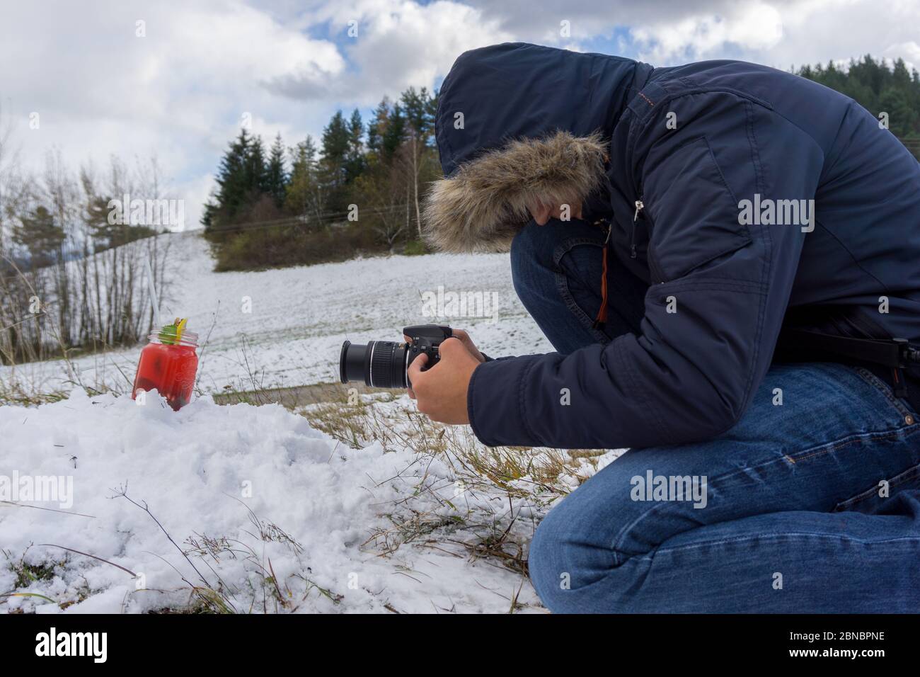 Man taking photo photograph picture in snow hi-res stock photography ...