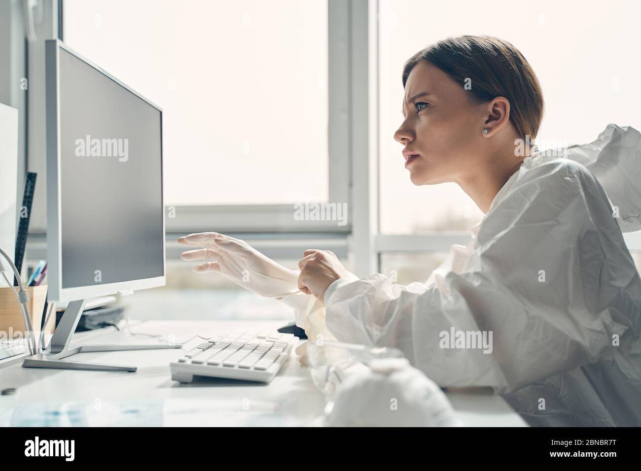 Work pandemic charming female office hi-res stock photography and ...