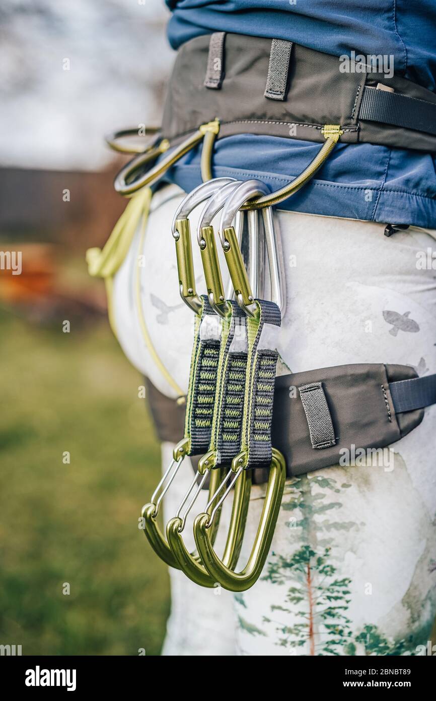 Closeup shot of a climber equipped with a quickdraw set Stock Photo - Alamy