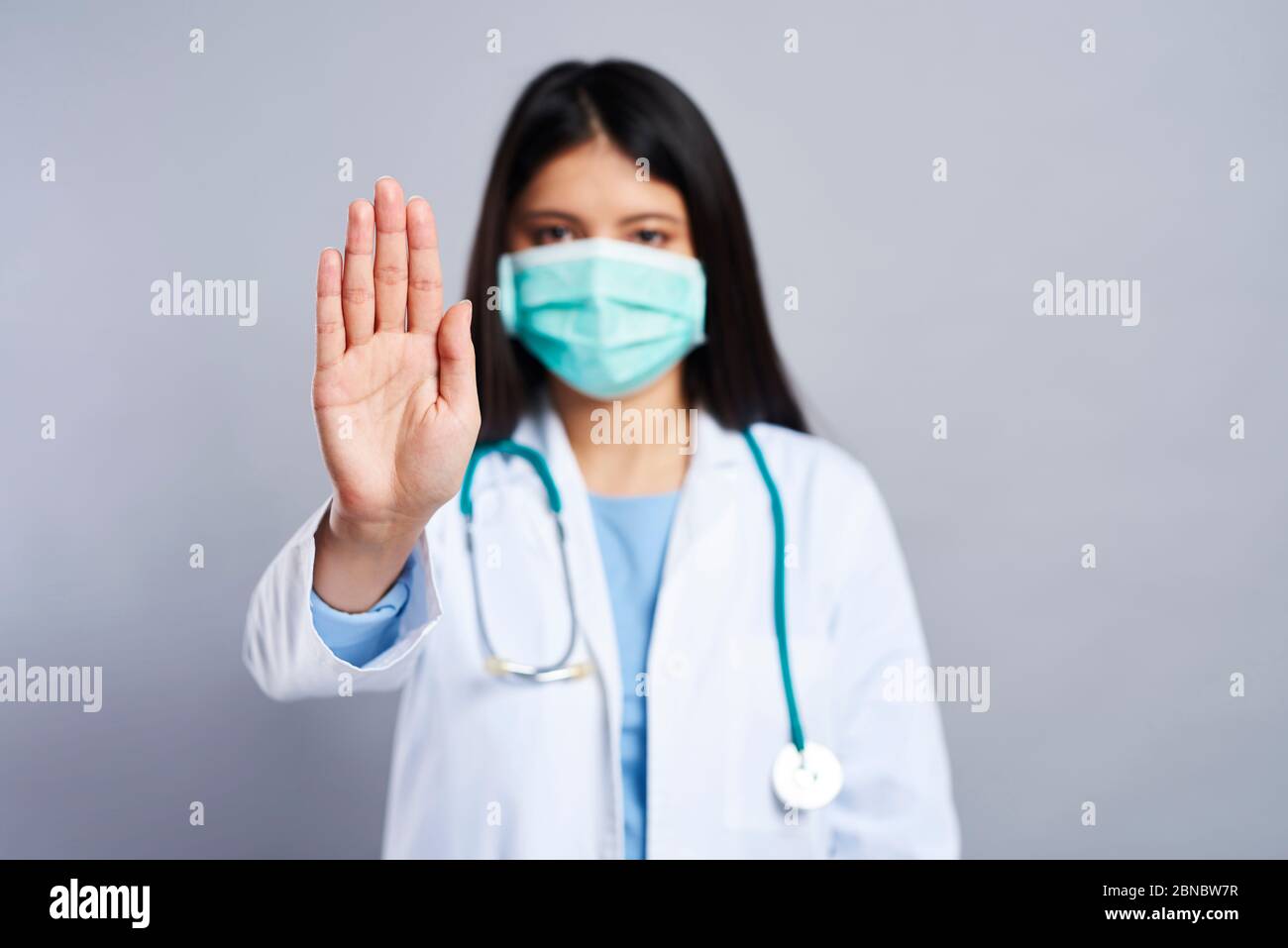 Doctor showing stop sign hi-res stock photography and images - Alamy