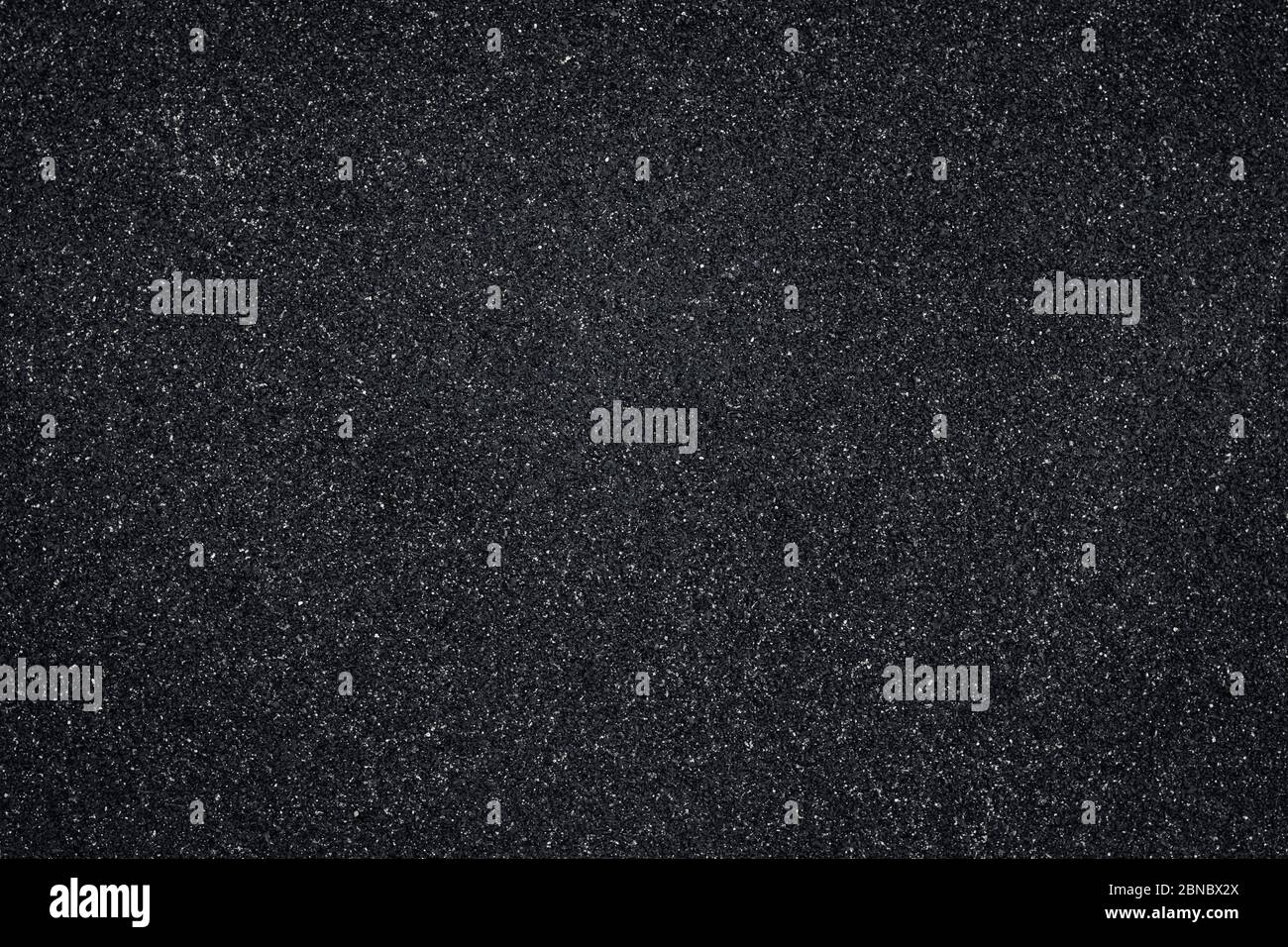 Asphalt texture, black pattern of roadway, grainy surface of pavement ...