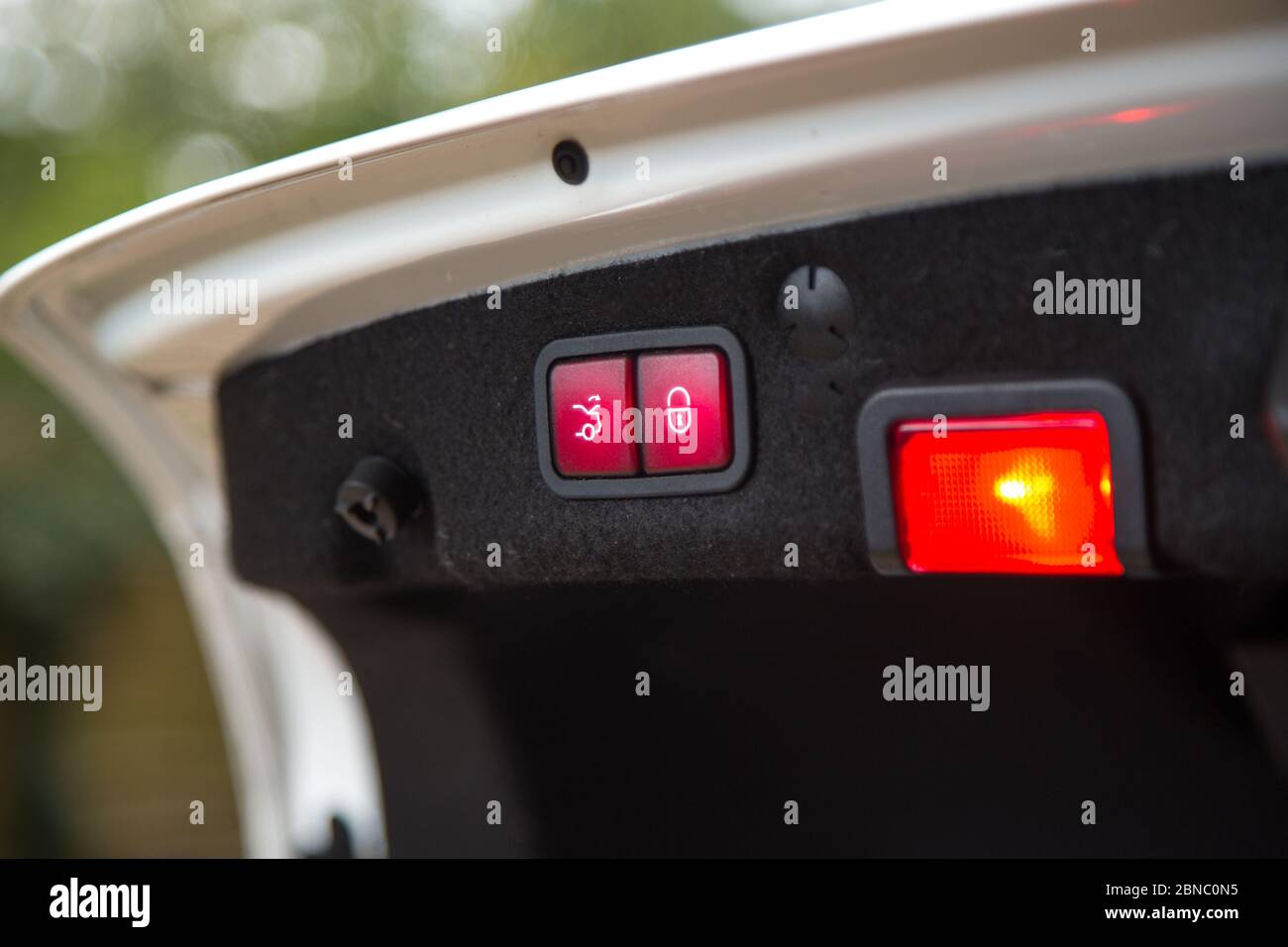Closeup shot of control buttons on a car trunk Stock Photo - Alamy