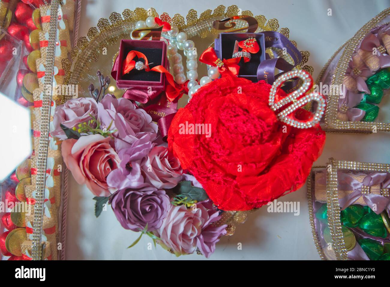Engagement rings inside the pink and blue box . Engagement heart basket ...