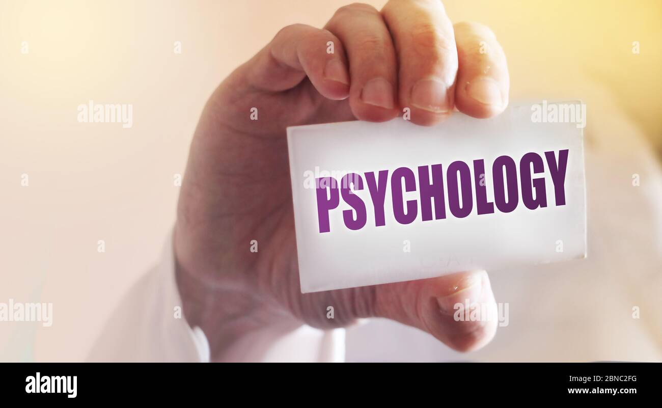 Psychology word written on a card in doctor's hand. Antistress therapy ...