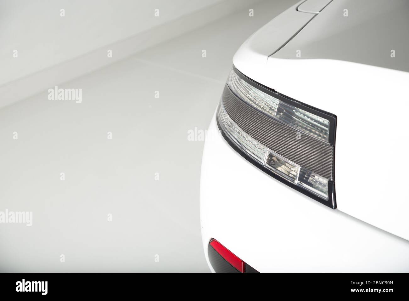 Closeup shot of tail light of a car with white background Stock Photo ...