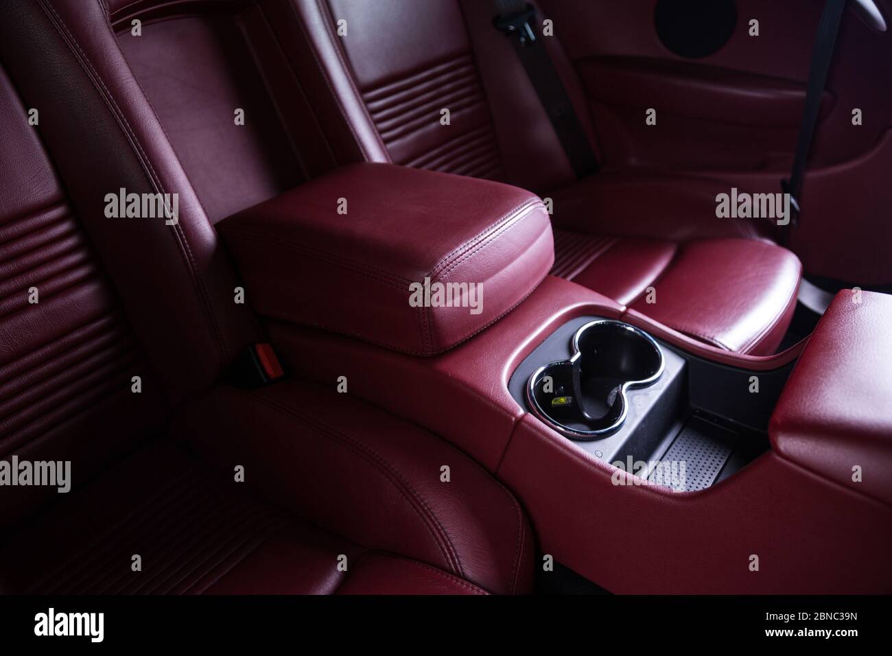 Beautiful red interior of a luxurious car with red and black details ...