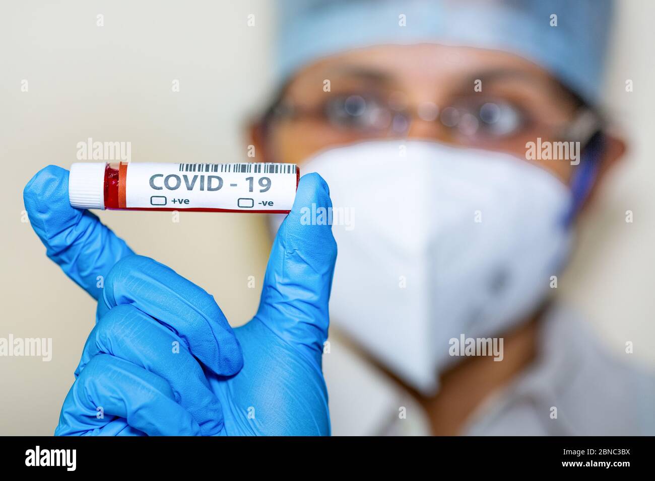 Indian doctor blood tube hi-res stock photography and images - Alamy
