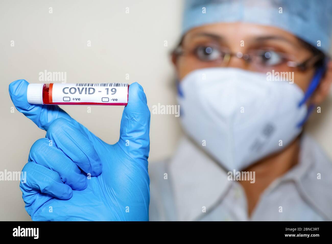 Indian with test tube hi-res stock photography and images - Alamy