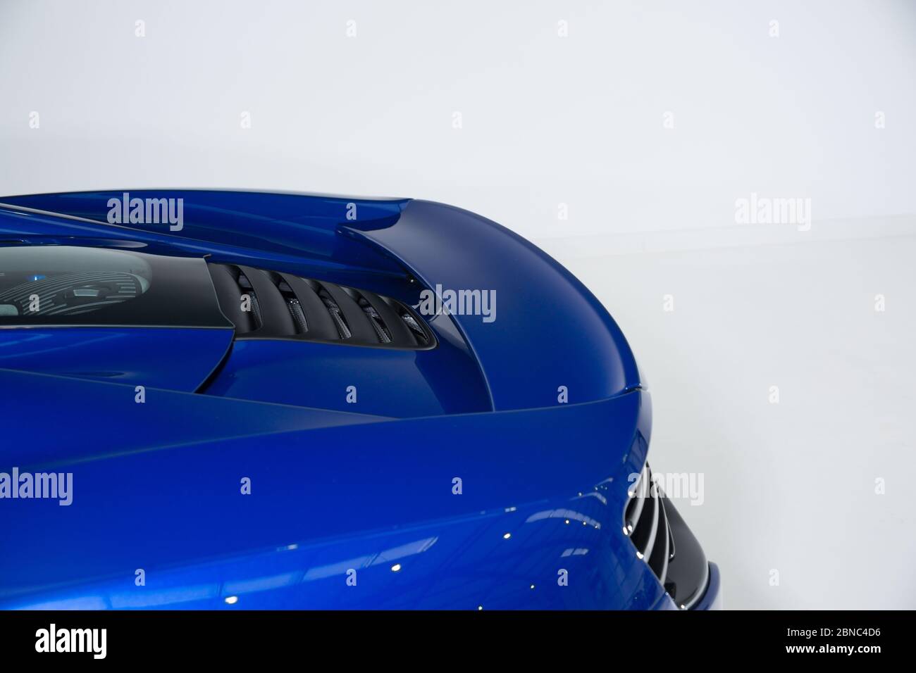 Trunk of the sportscar with white background Stock Photo - Alamy
